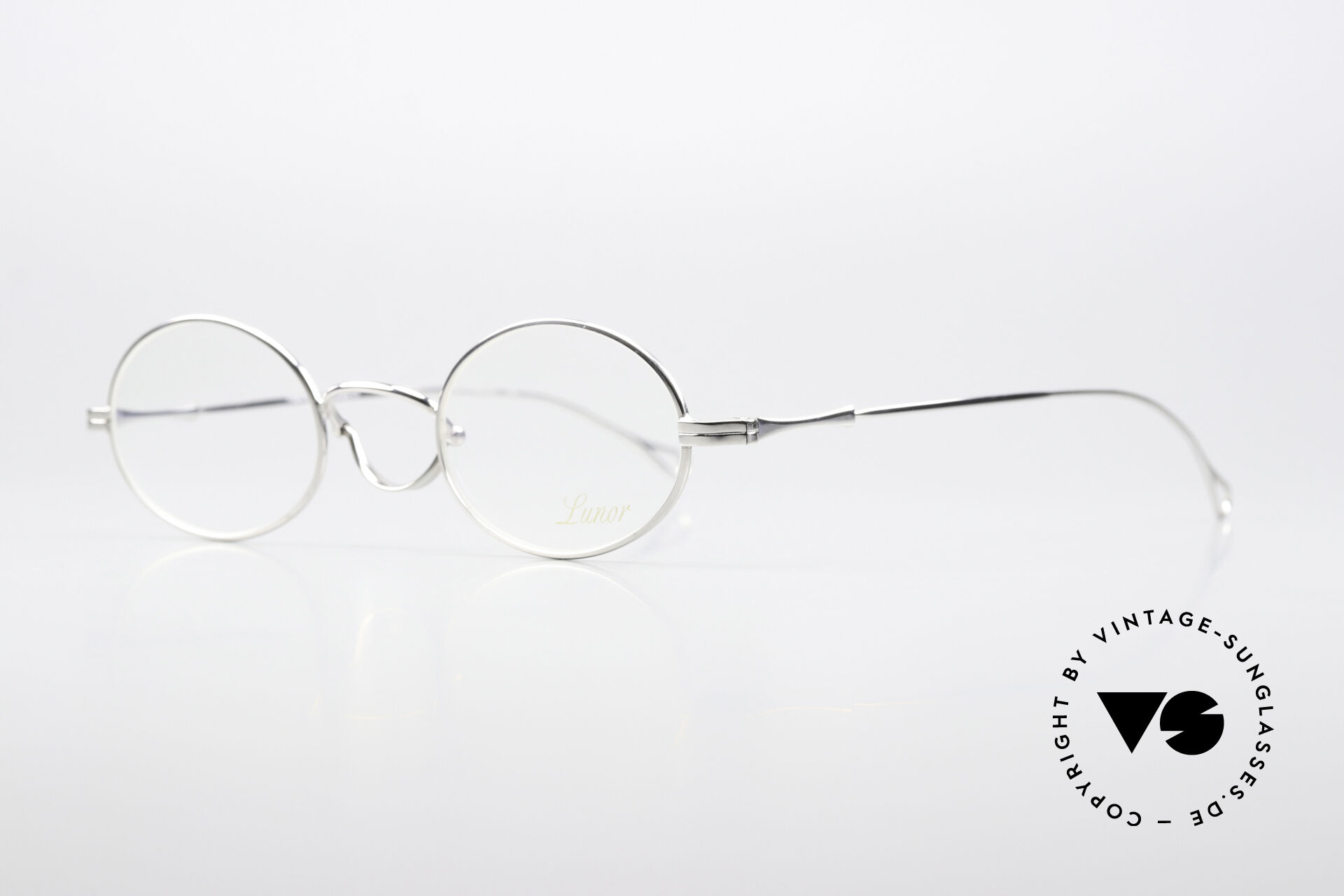 oval silver specs frame